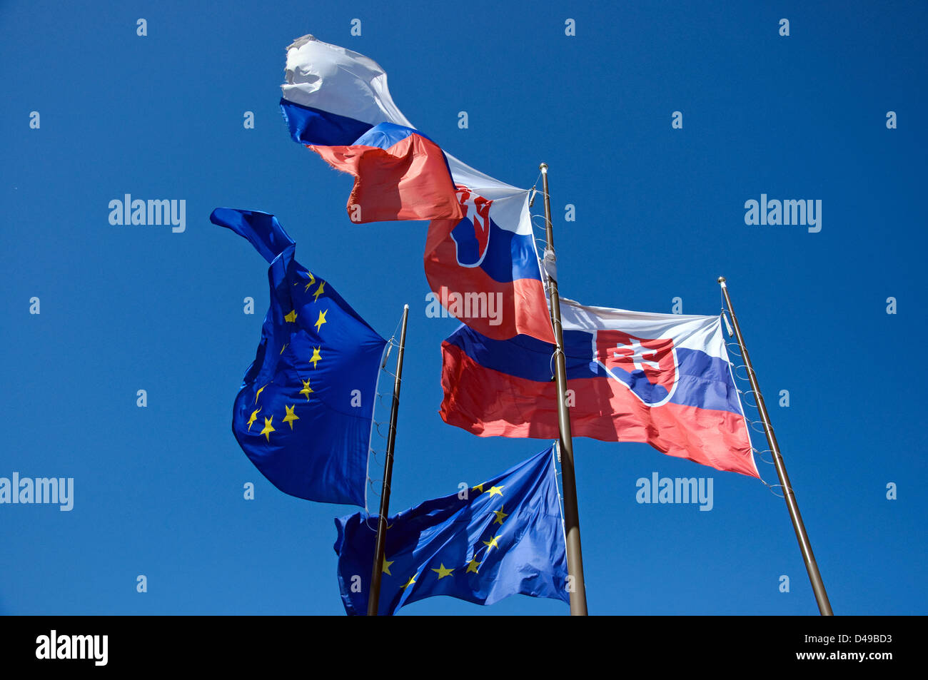 Photo of flags of Slovakia and European Union waving on wind Stock ...