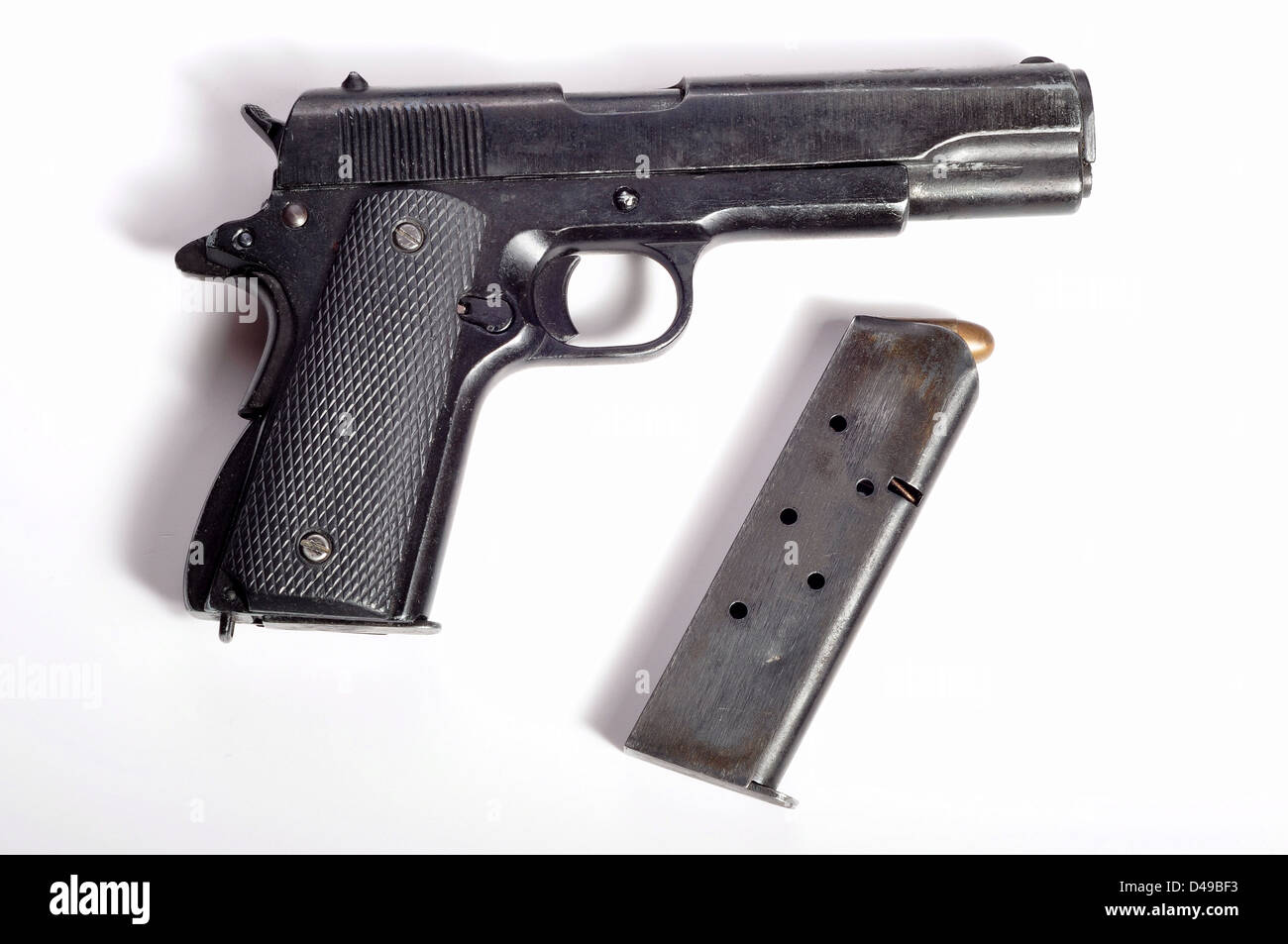 Photo of gun on white background Stock Photo - Alamy