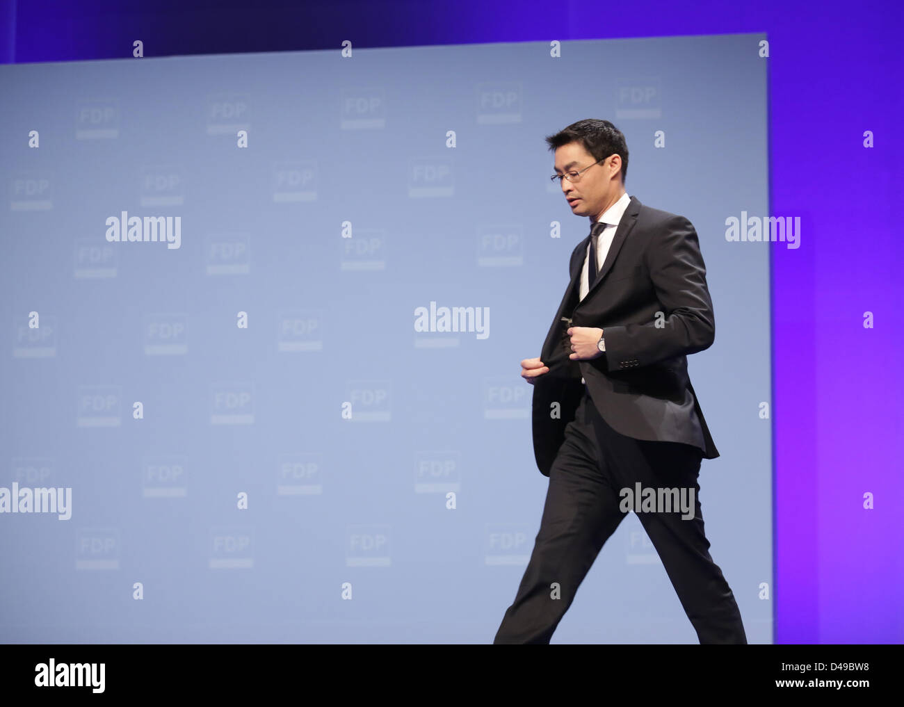 The acting chairman of the FDP, Philipp Roesler, walks on stage during ...