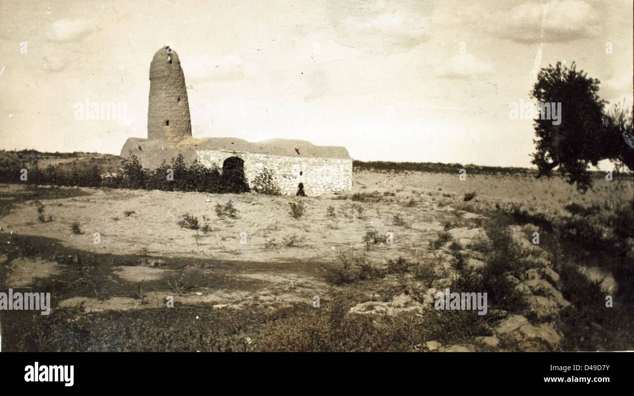 A photograph by Edwin Newman showing a lookout tower in Iraq, used by ...