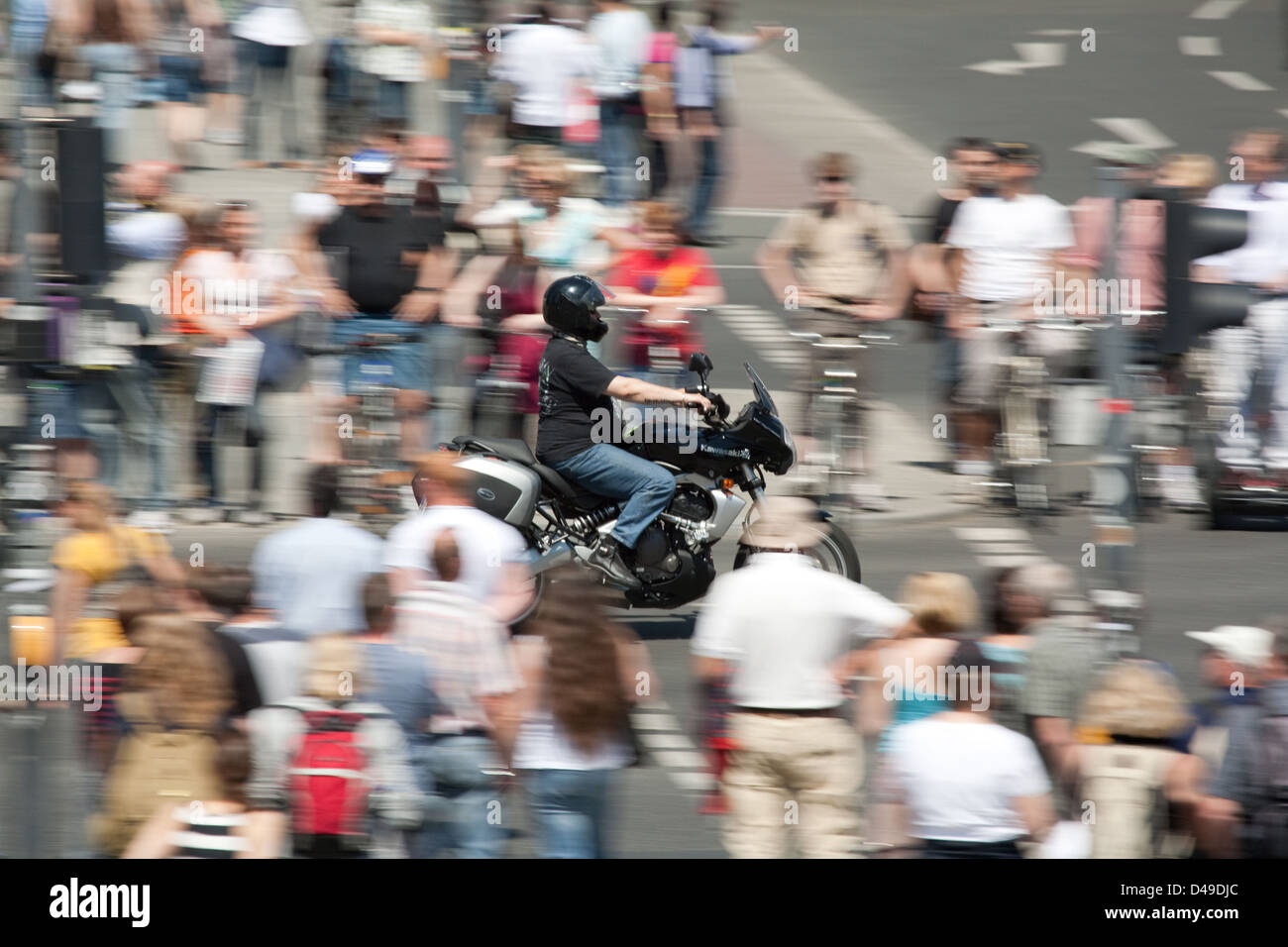 Berlin, Germany, motorcyclists drive through a crowd Stock Photo - Alamy