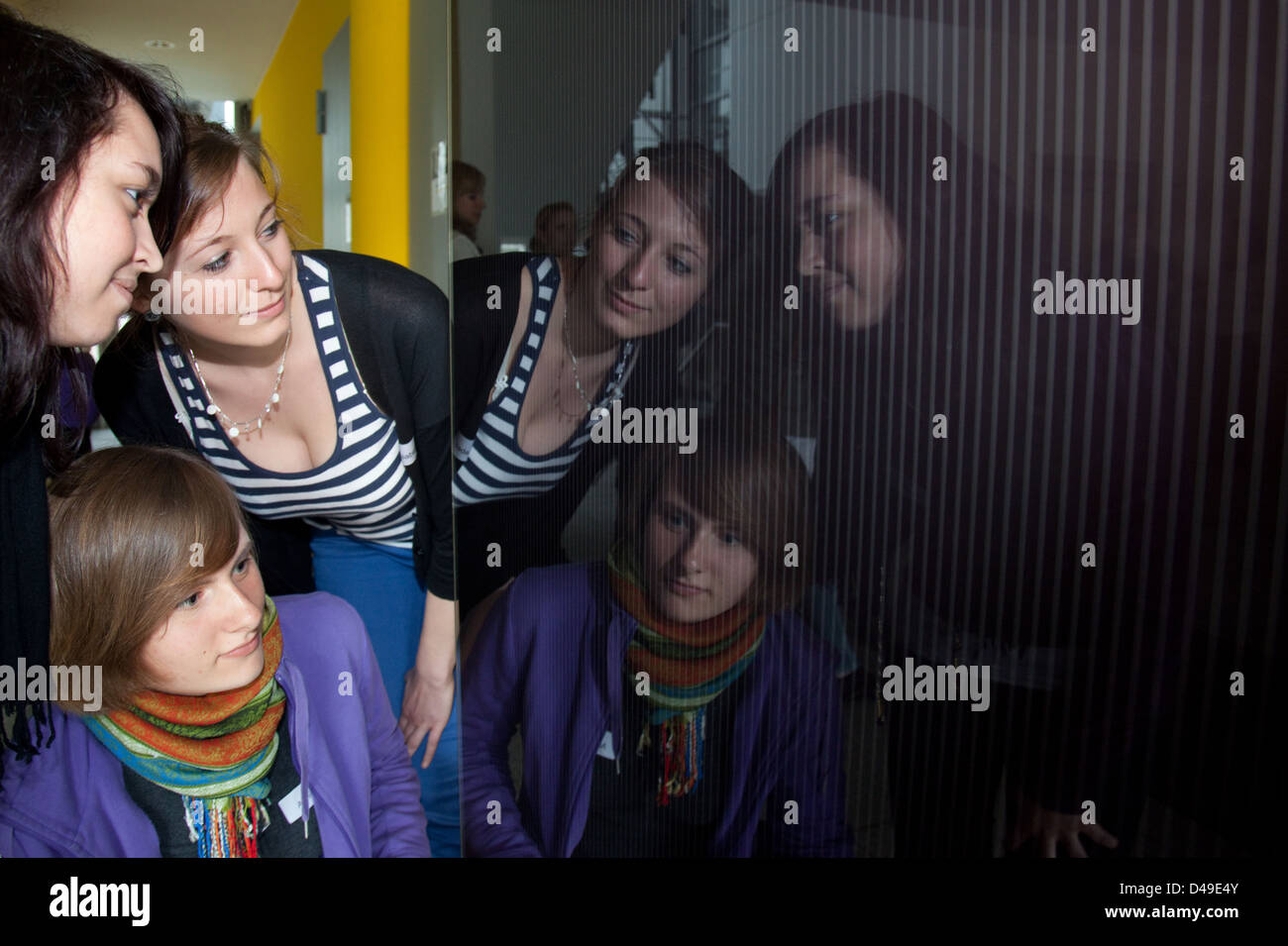 Berlin, Germany, Girls' Day, Schuelerinnen consider a solar module ...