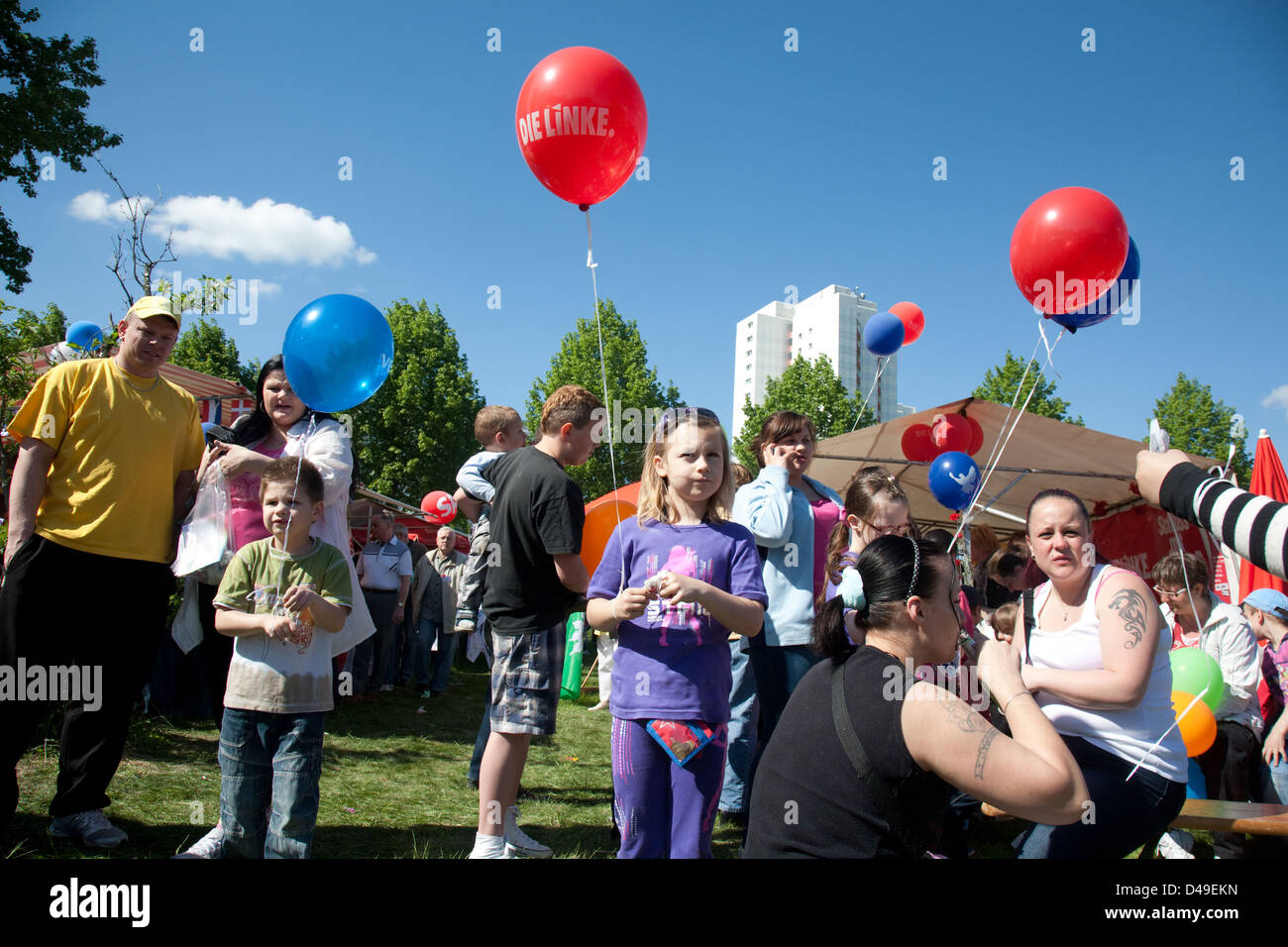 Berlin, Germany, children with colorful balloons on the family hard ...