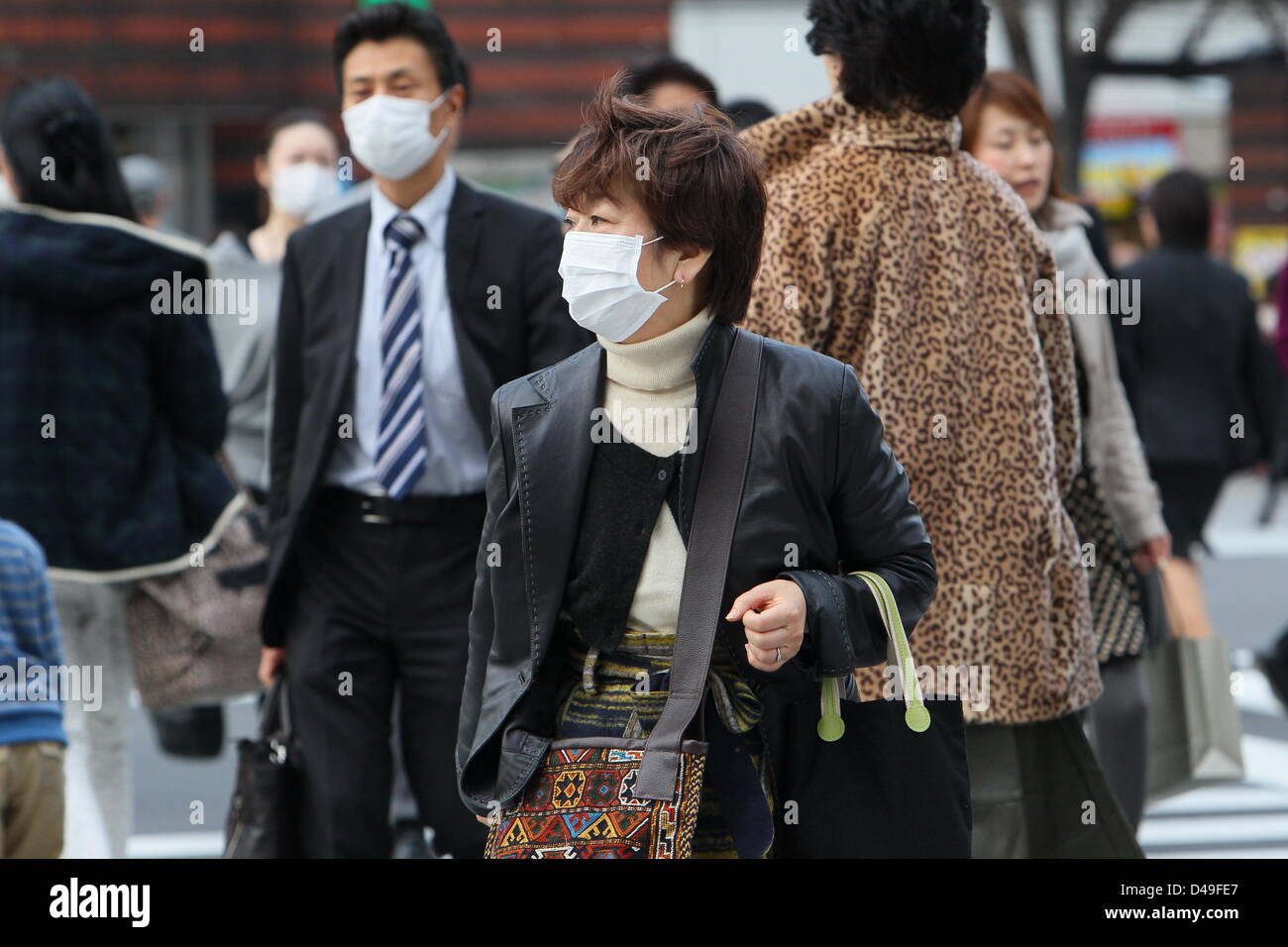 March 8, 2013, Tokyo, Japan : People wear protective face masks in ...