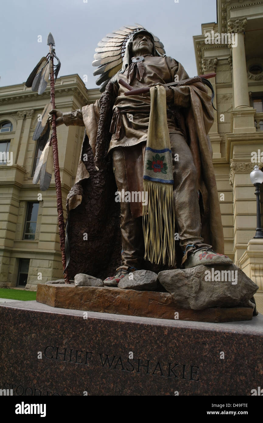 Grey sky portrait bronze statue Chief Washakie standing named plinth ...