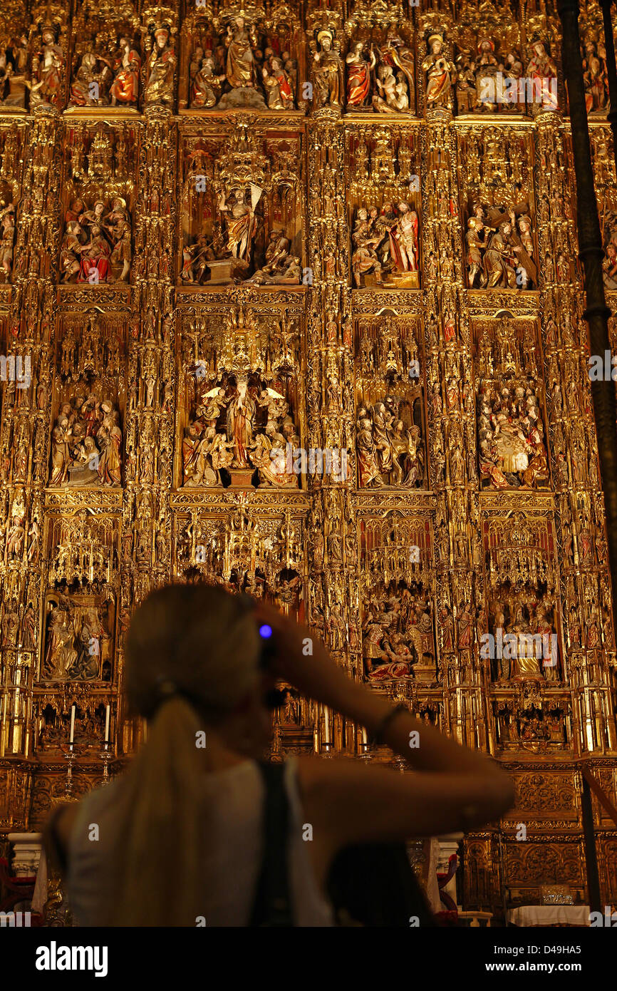 Seville, Spain, with high altar retablo in the Cathedral of Seville ...