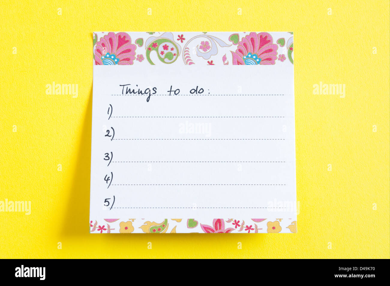 Close up of a sticky note saying Things To Do list - yellow background ...