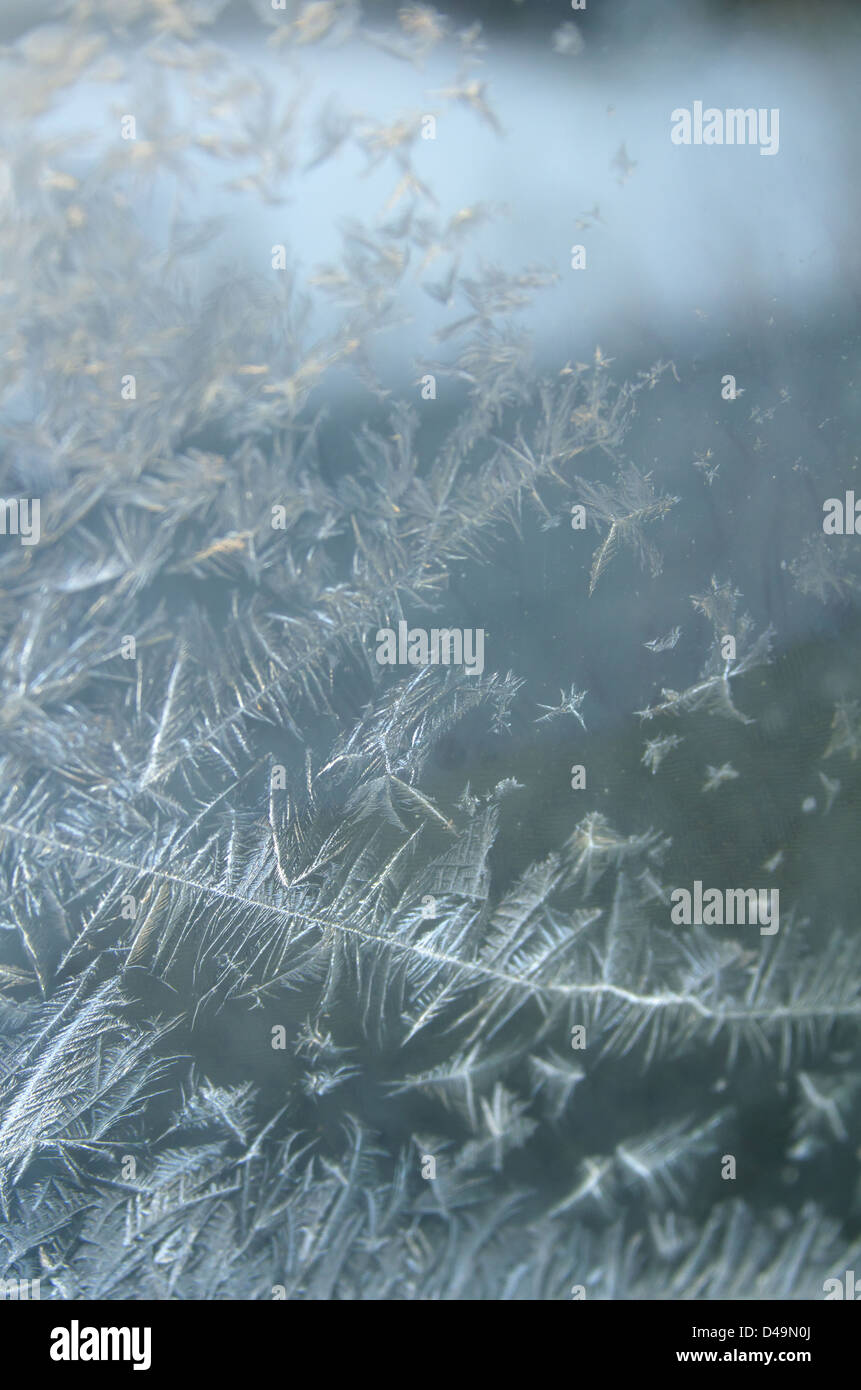 Delicate frost patterns on window glass Stock Photo - Alamy