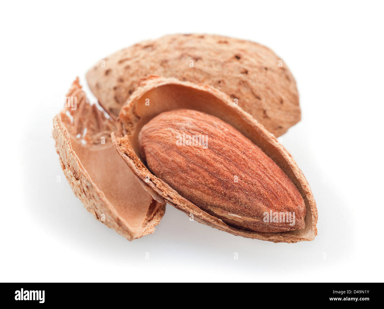 Roasted almond nut isolated on white Stock Photo - Alamy