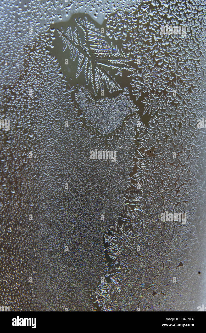 Frost melting on a window pane Stock Photo - Alamy