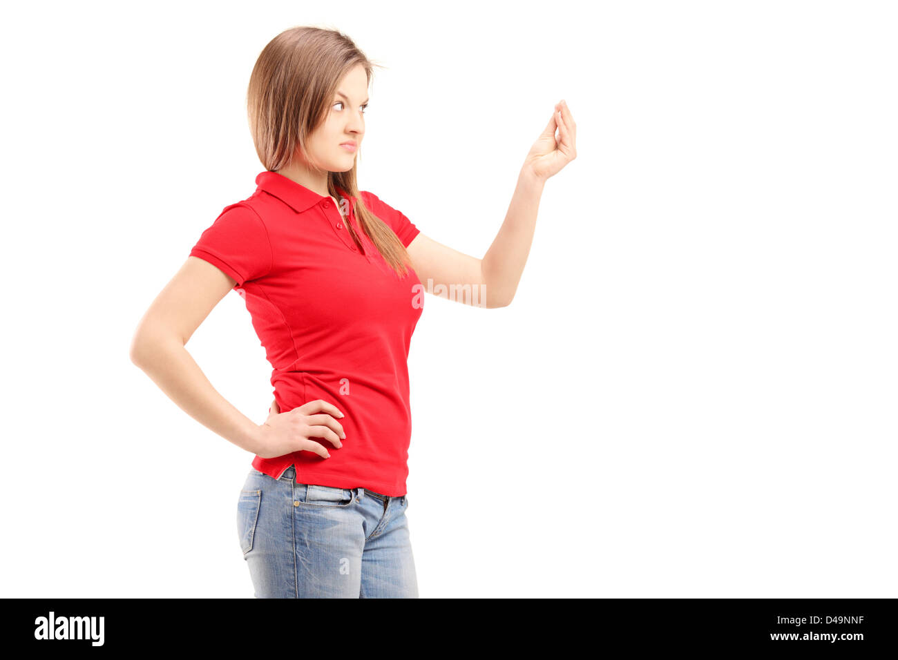 Curious young woman gesturing with hand isolated on white background ...