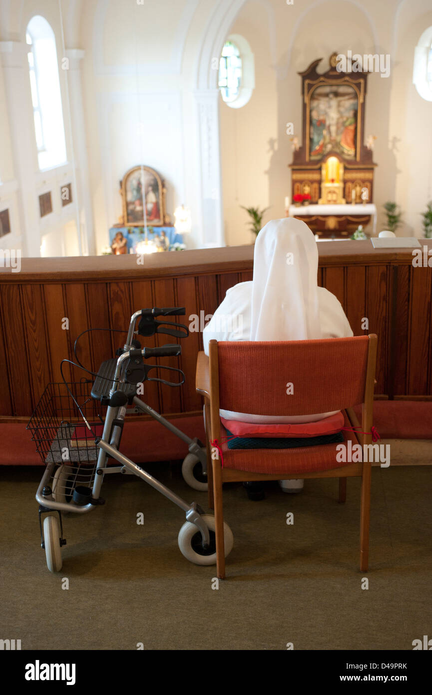 Praying inside catholic church hi-res stock photography and images - Alamy