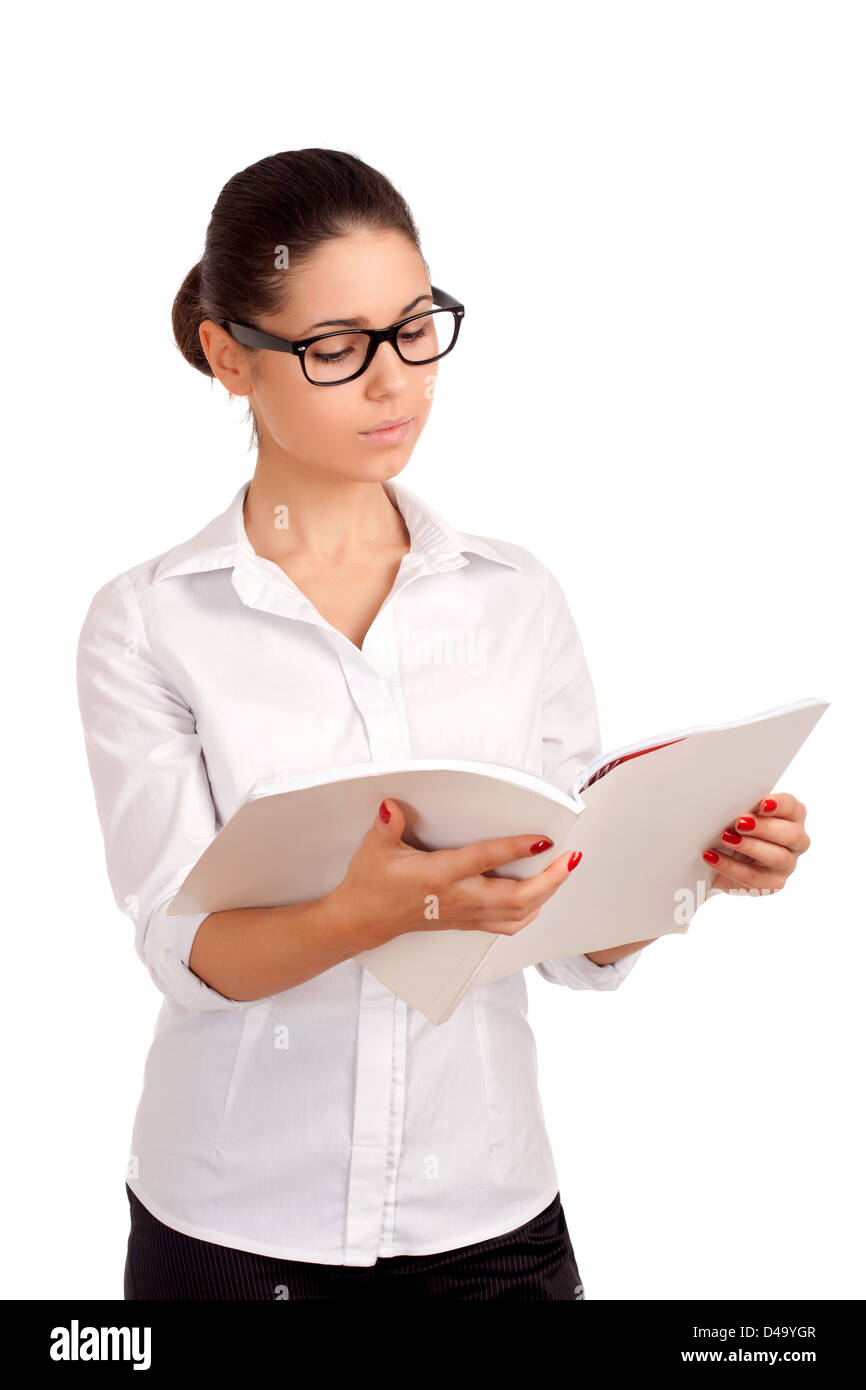 Smiling business woman holding magazine Stock Photo - Alamy