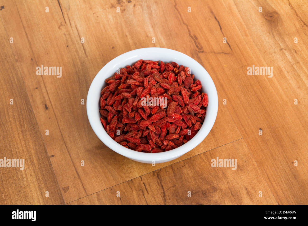 Dried goji berries in a bowl Stock Photo - Alamy