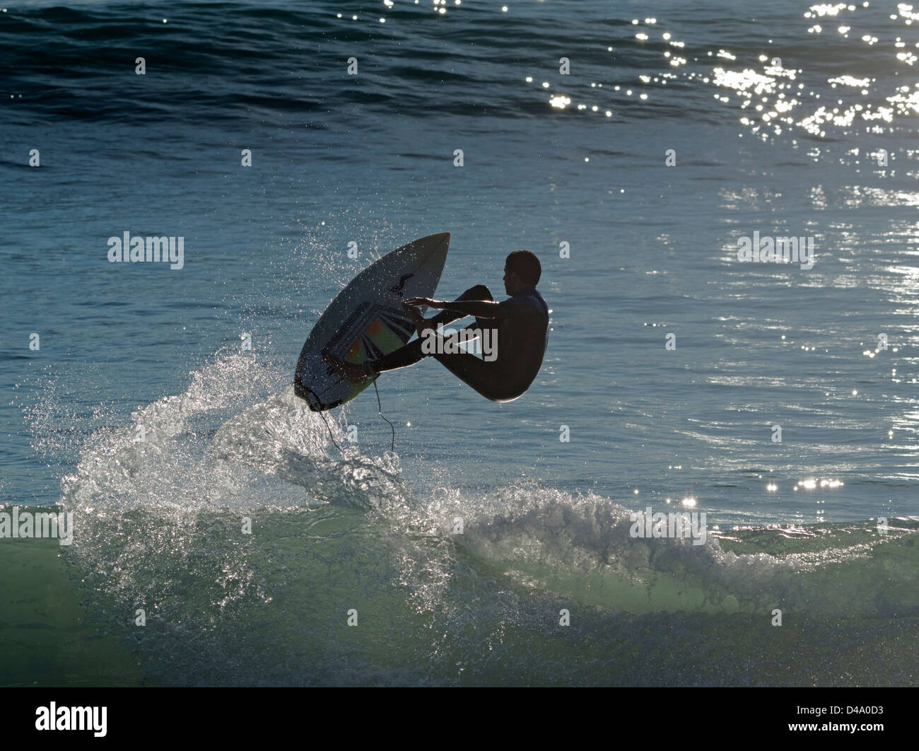 Surfer and wave Stock Photo - Alamy