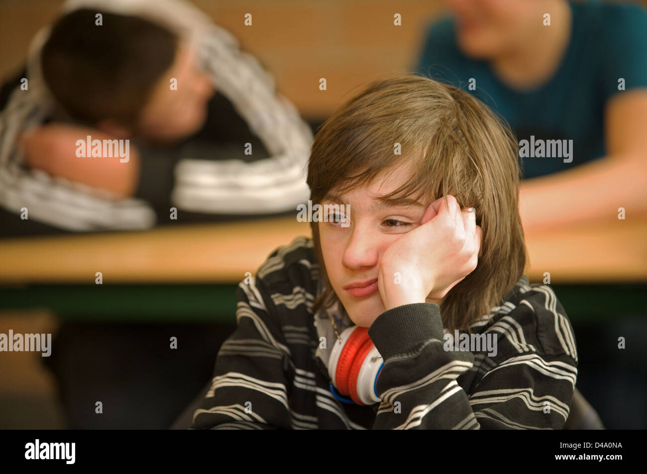 Bored child at school Stock Photo - Alamy
