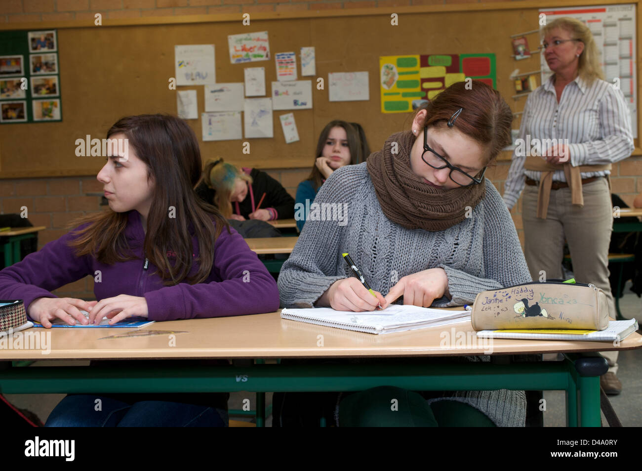 German classroom with student and teacher Stock Photo - Alamy