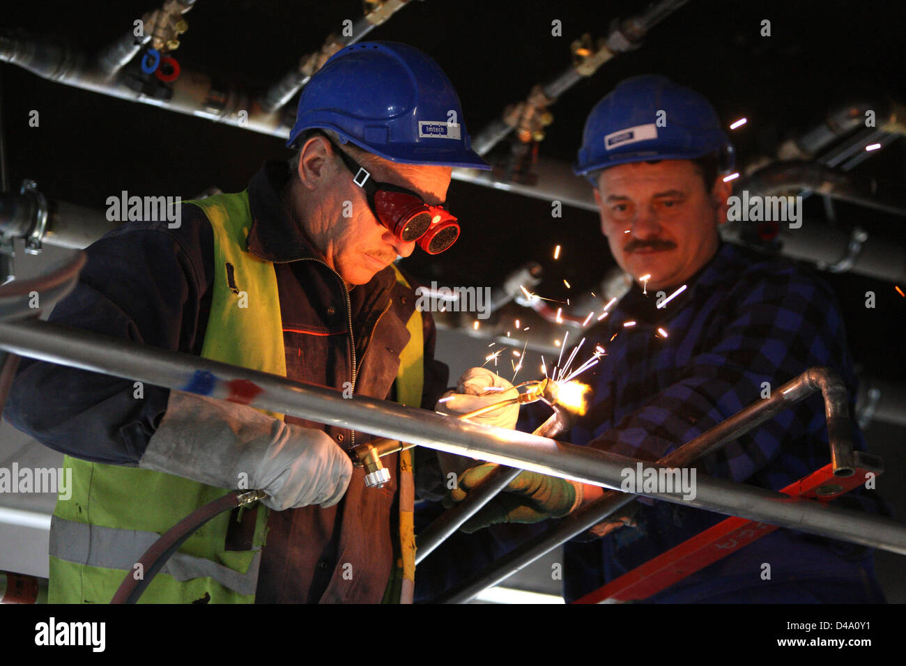 Schoenefeld, Germany, welders on the BBI construction site Stock Photo ...