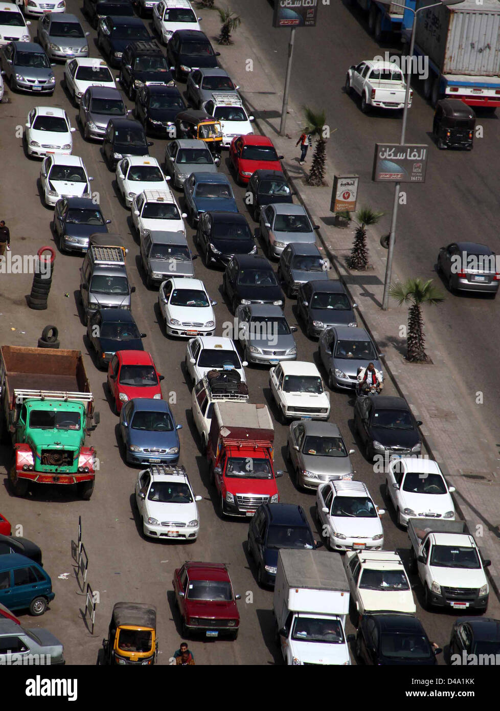 Cairo, Egypt. 10th March, 2013. Egyptians microbus drivers park their ...