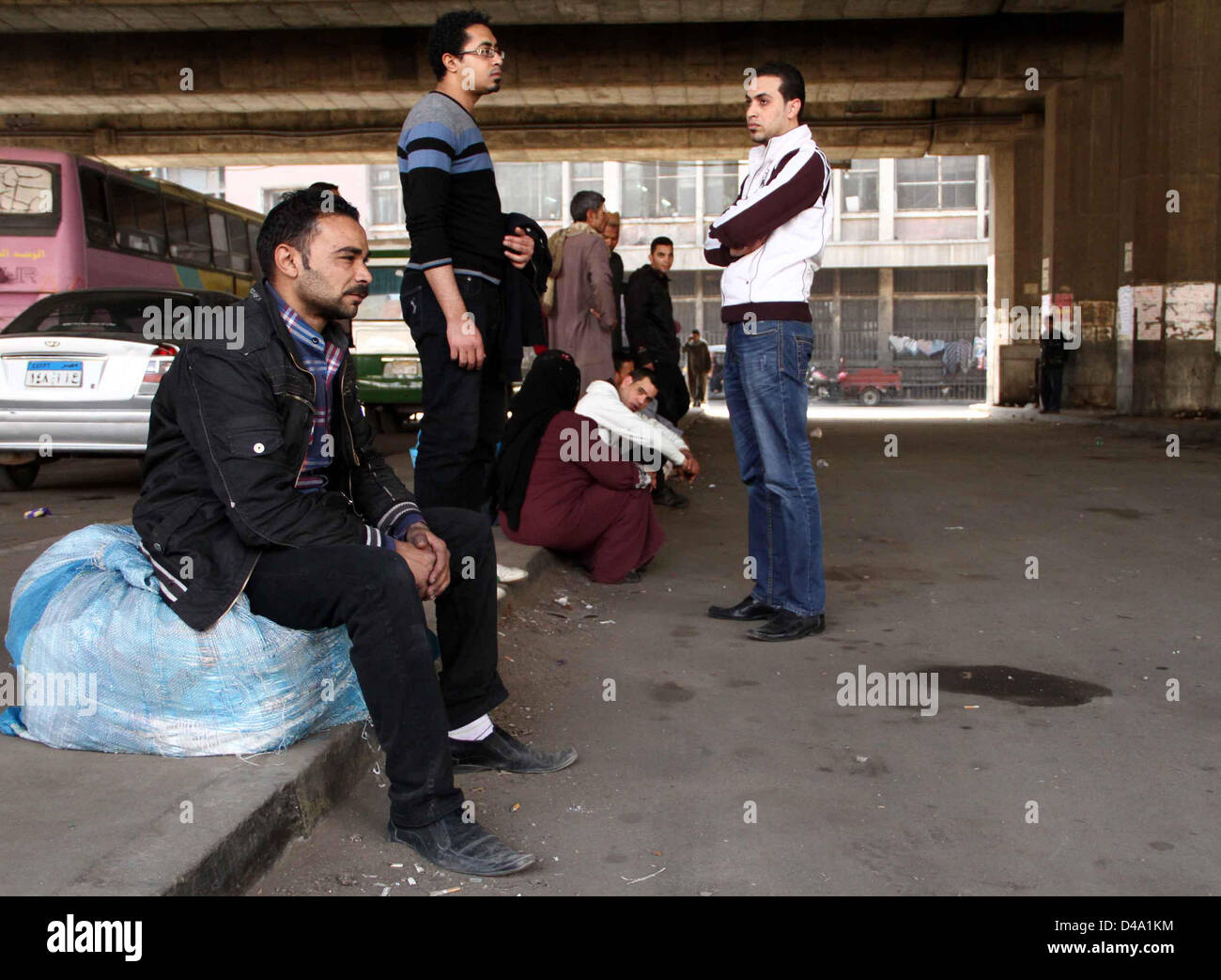 Cairo, Egypt. 10th March, 2013. Egyptians microbus drivers park their ...