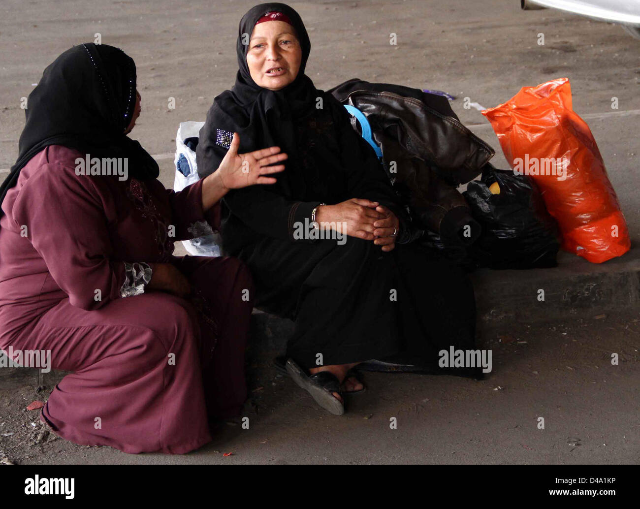 Cairo, Egypt. 10th March, 2013. Egyptians microbus drivers park their ...