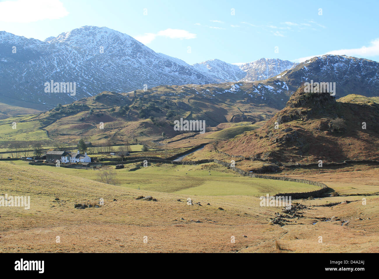 Fell Foot Farm and Castle Howe with Wetherlam and the snowy Coniston ...