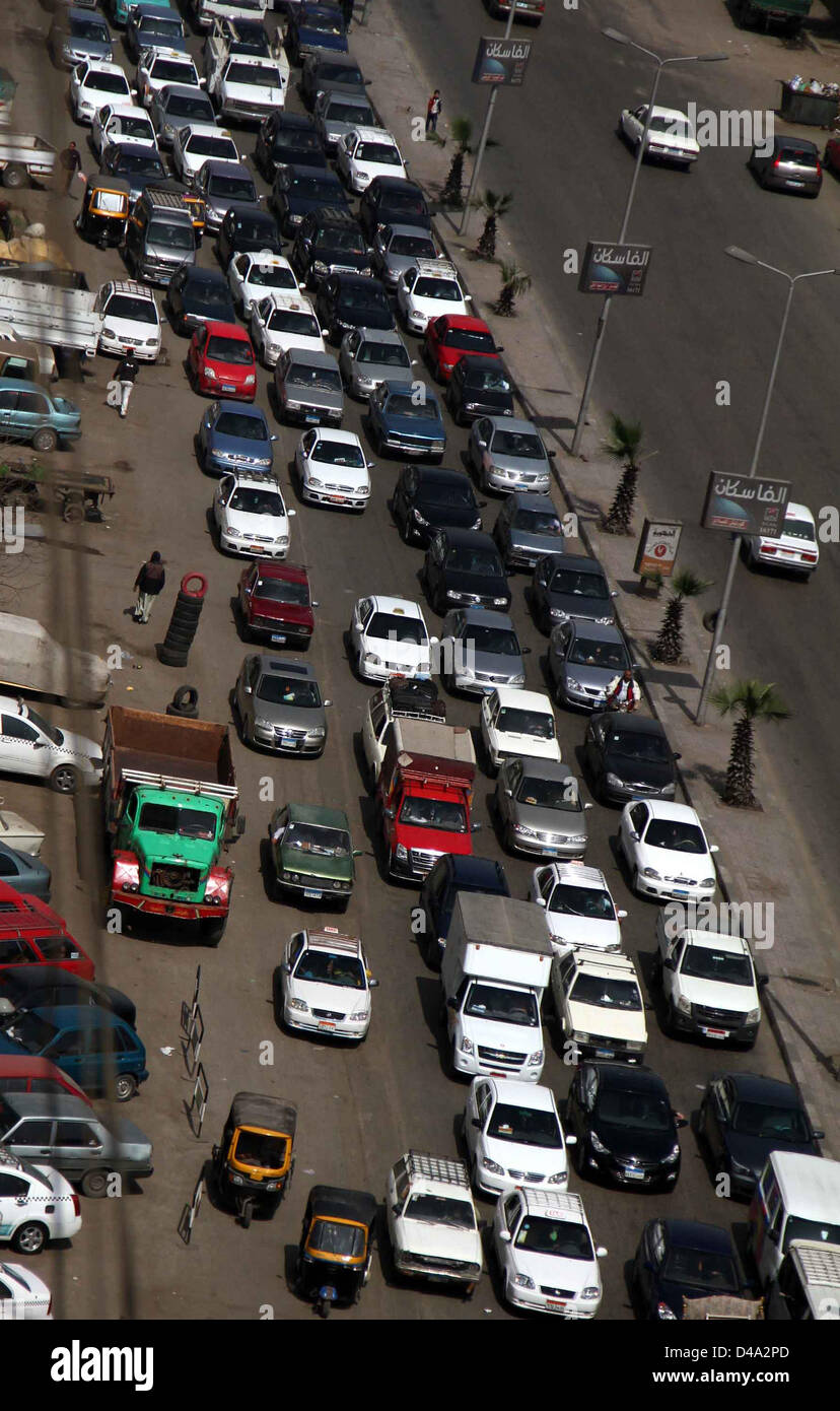 Cairo, Egypt. 10th March, 2013. Egyptians microbus drivers park their ...