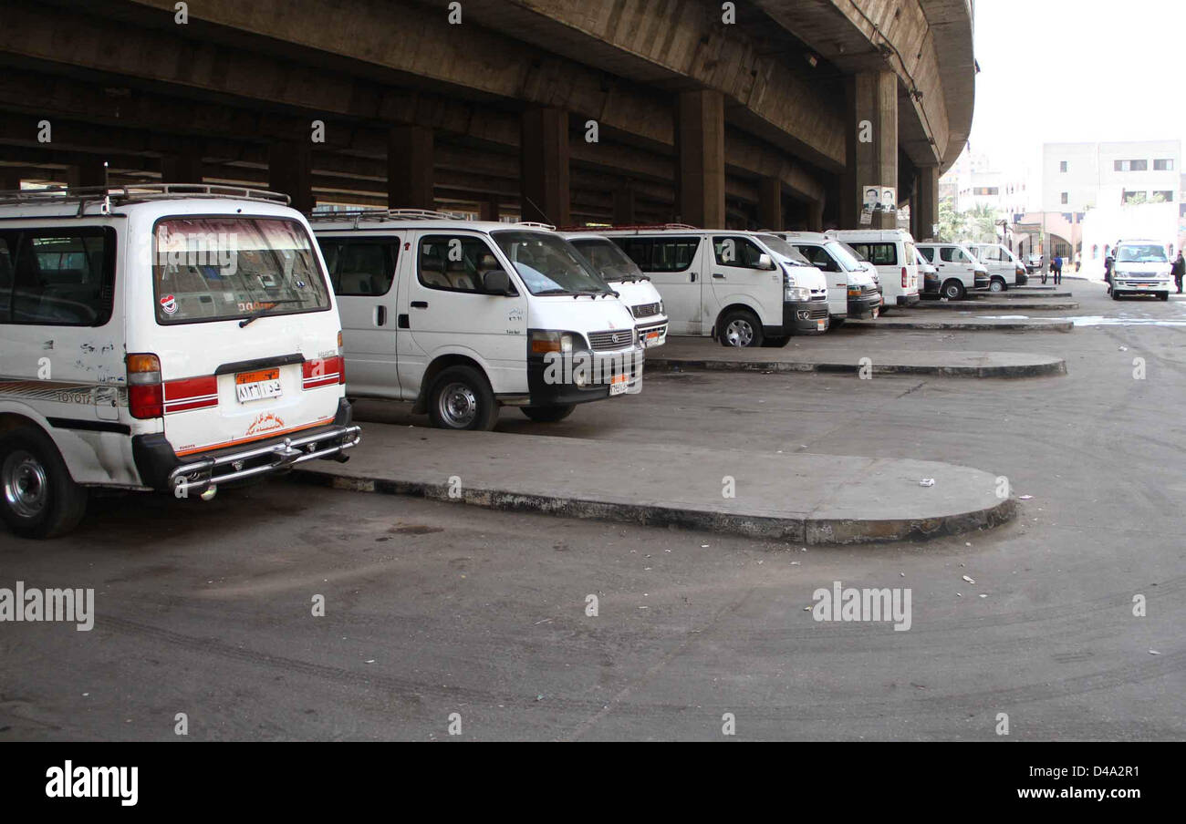 Cairo, Egypt. 10th March, 2013. Egyptians microbus drivers park their ...