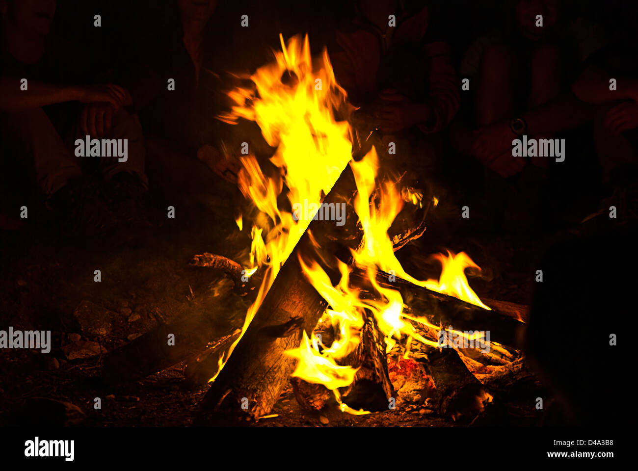 Burning fire at a campsite in the Romanian Alps Stock Photo - Alamy