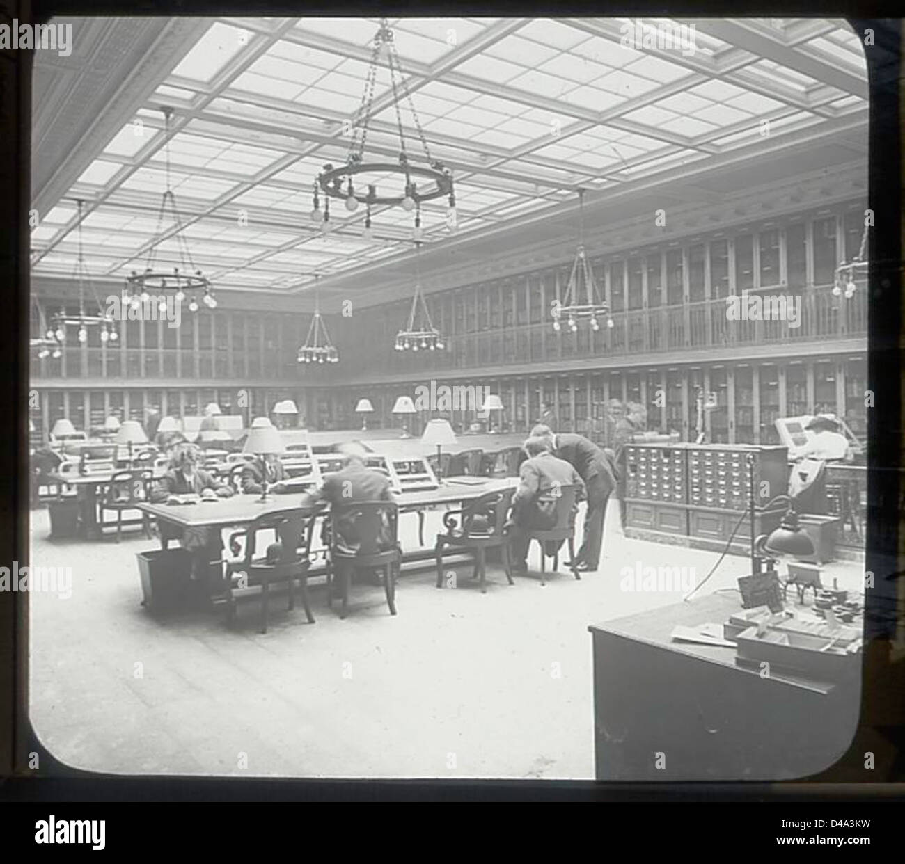 This 1911 photograph features the card catalog system inside a library ...