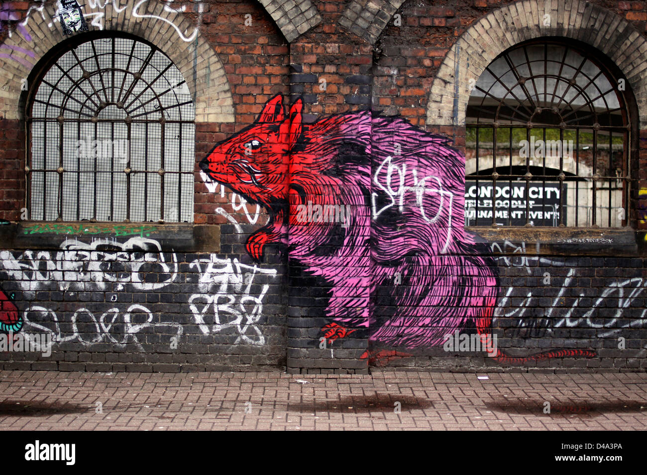 Giant rat sprayed onto a building in Shoreditch, East London Stock ...