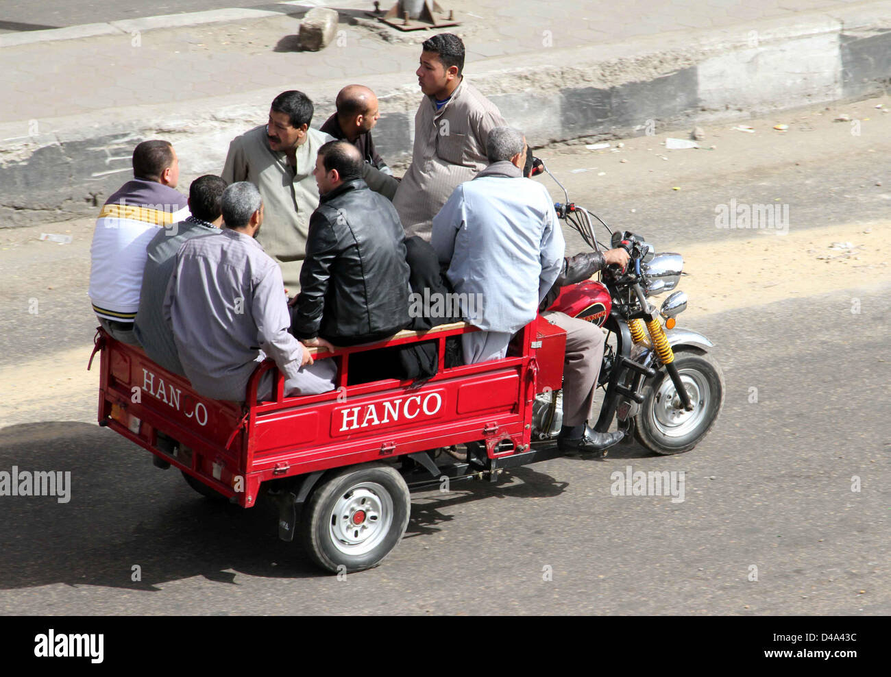 March 10, 2013 - Cairo, Cairo, Egypt - Egyptians ride a tricycle in ...