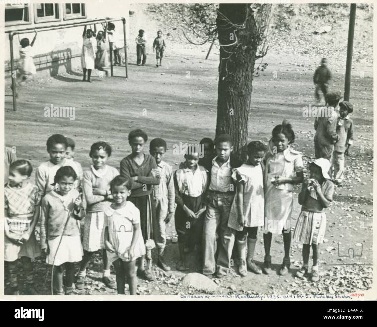 In this photograph from 1935, children of coal miners in Kentucky are ...