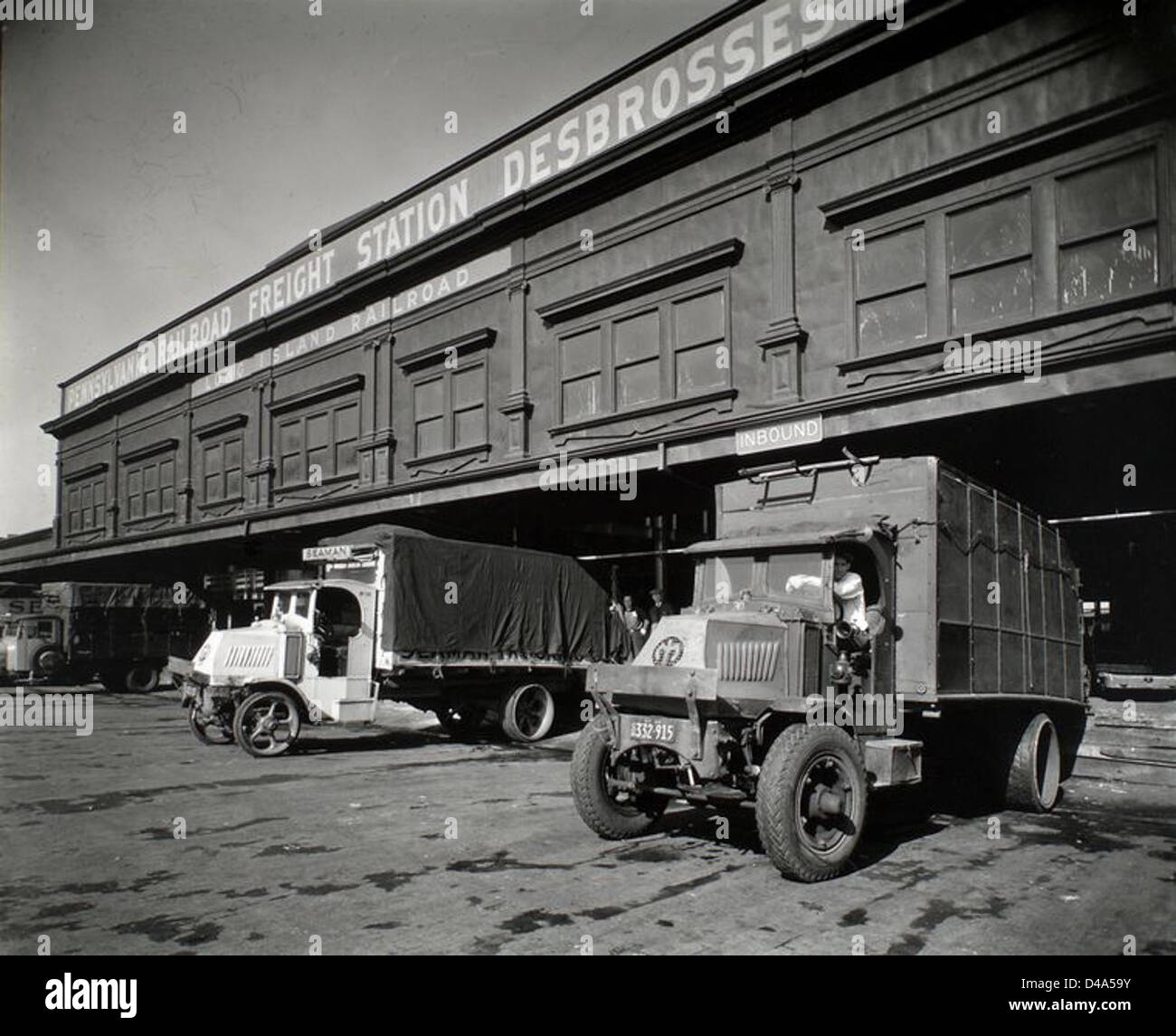 This image shows Mack AC Bulldog trucks in Manhattan, captured around ...