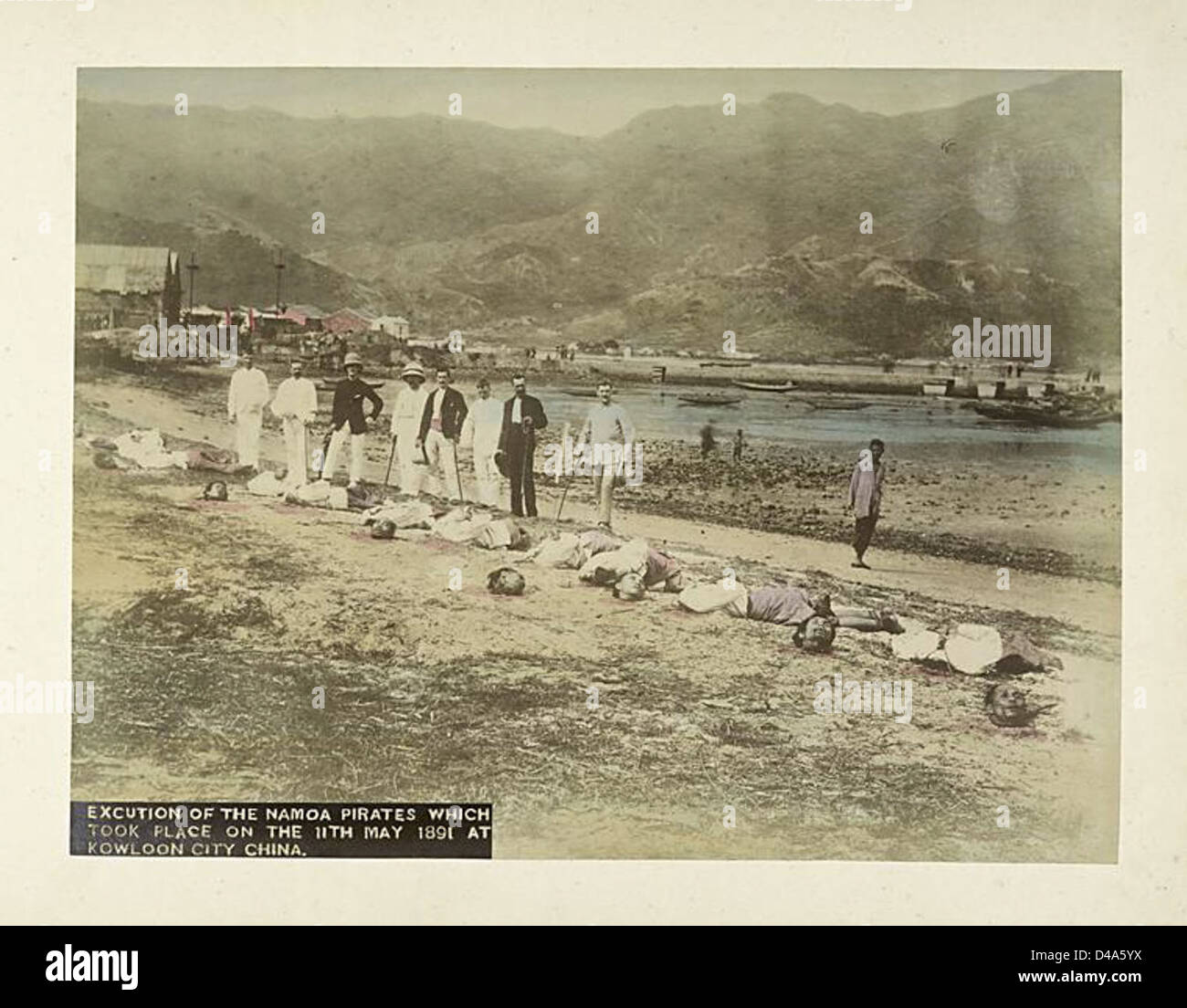 This photograph depicts the execution of pirates in Kowloon, Hong Kong ...