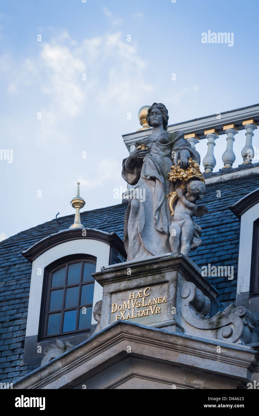 Statue on a roof in the Grand Place, Brussels Stock Photo - Alamy