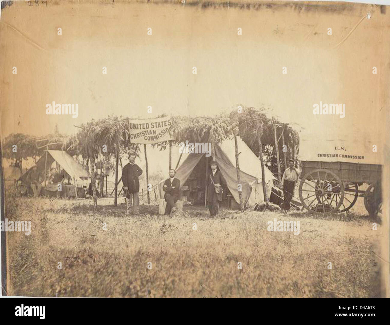 This 1865 photograph by Alexander Gardner shows four men standing in ...