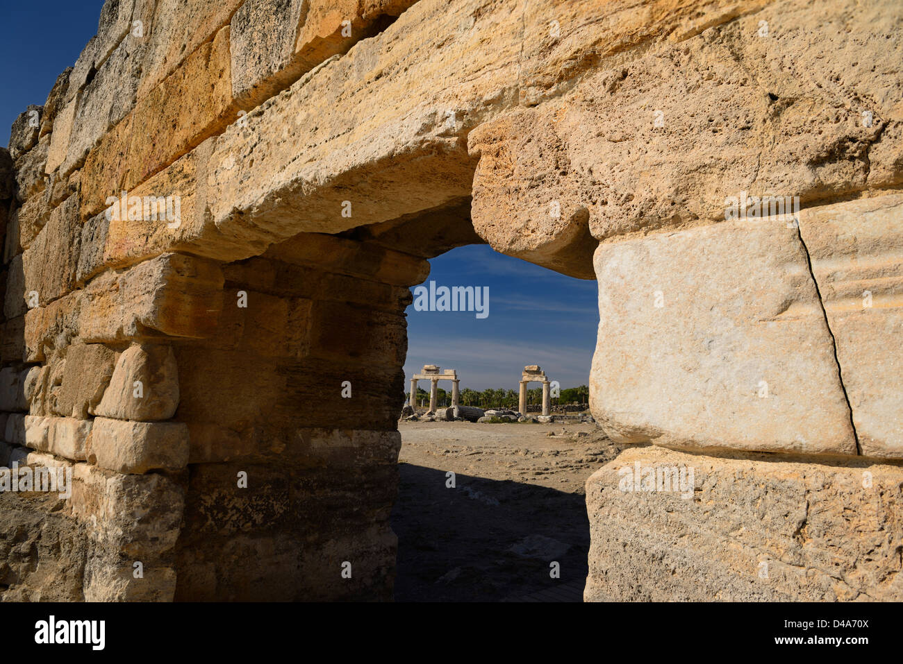 Ancient Roman columns with lintels seen through the stone block south ...