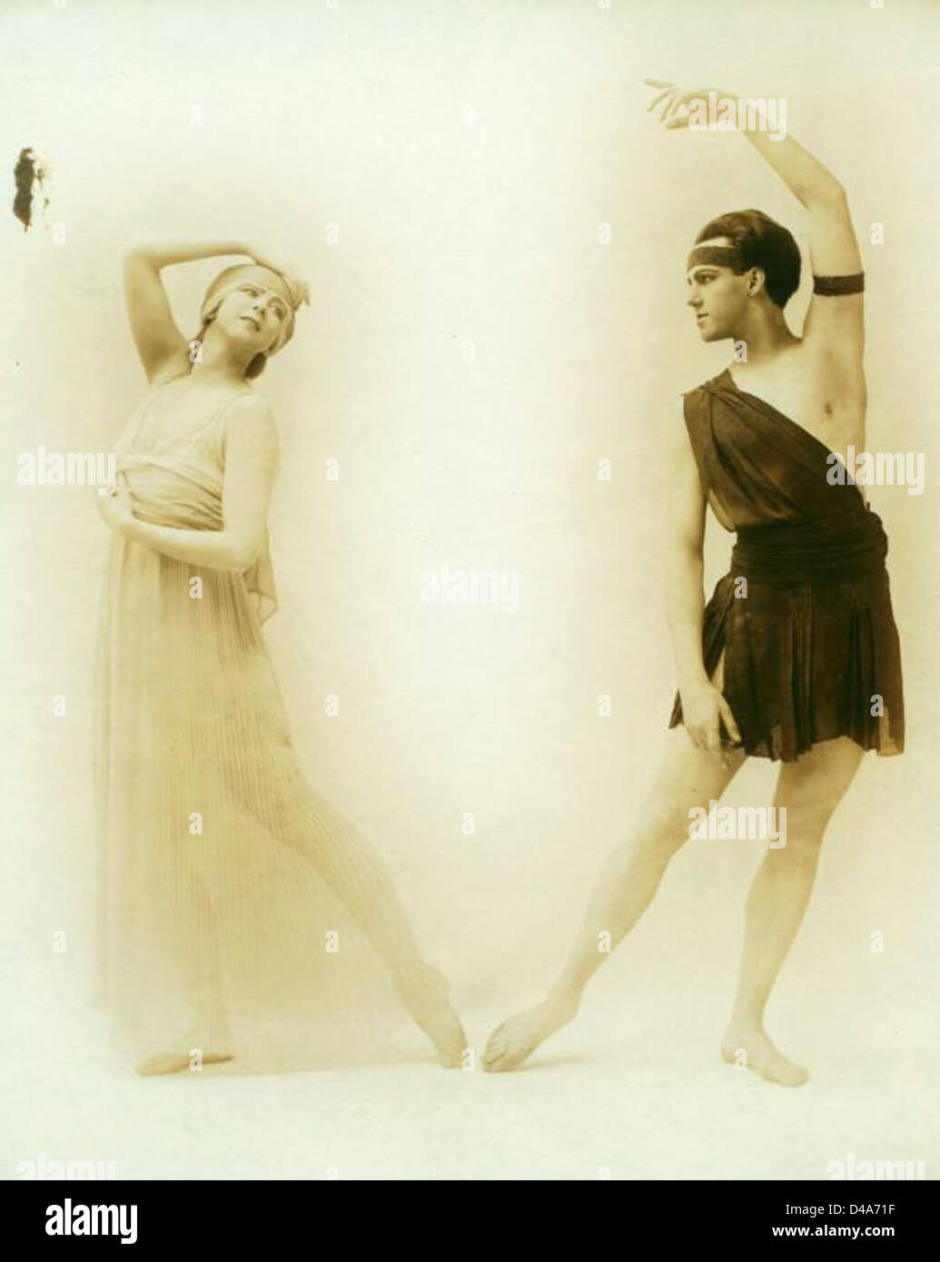 Ruth St Denis and Ted Shawn in costumes used for magazine ad Stock ...