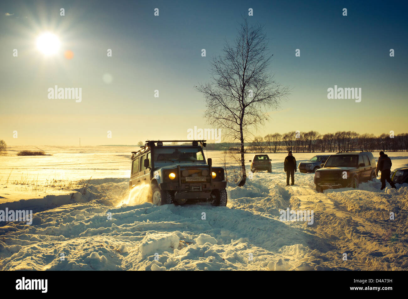 Land Rover Defender 110 suv front on background the Russian winter ...