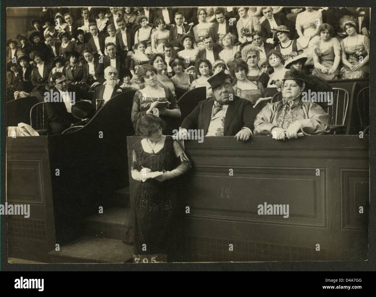 This 1913 silent film still from *Setting the Style* presents a scene ...