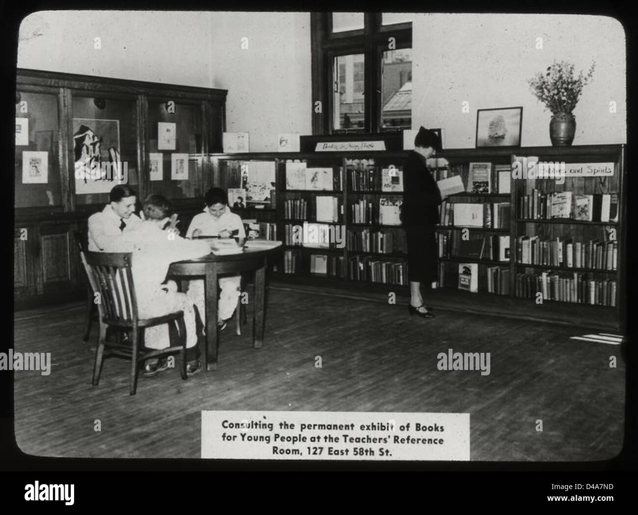A 1938 image depicting the teachers' reference room in a library ...
