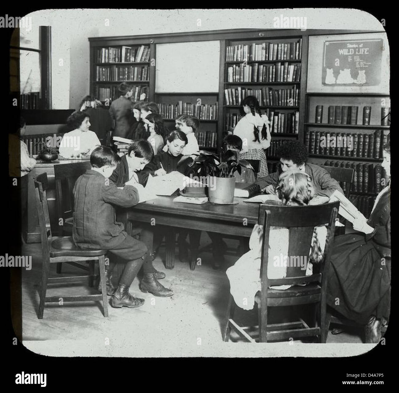 This 1913 photograph shows the Library for the Blind during a visit ...