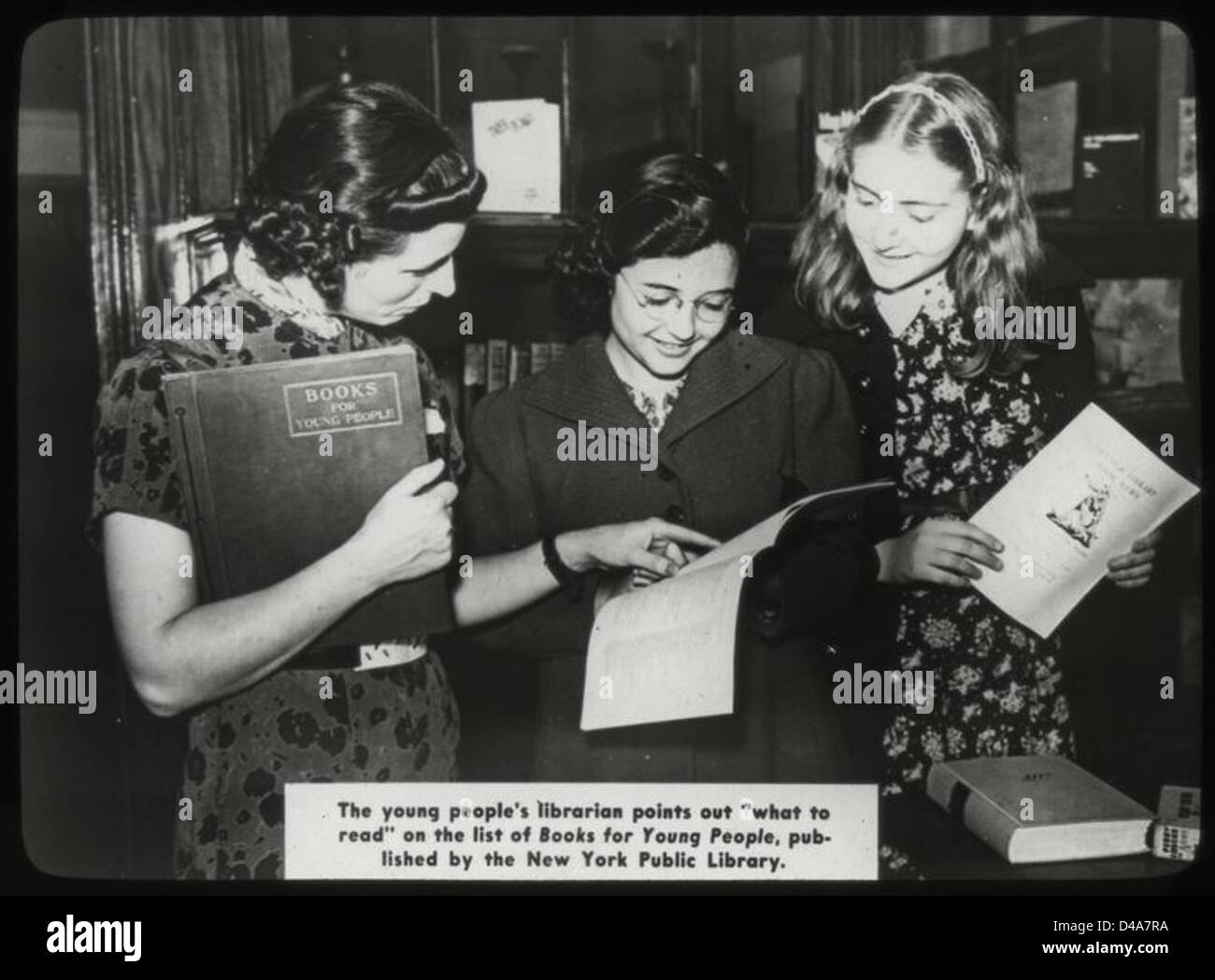 A 1938 photograph from the Aguilar Branch Library showing a young ...