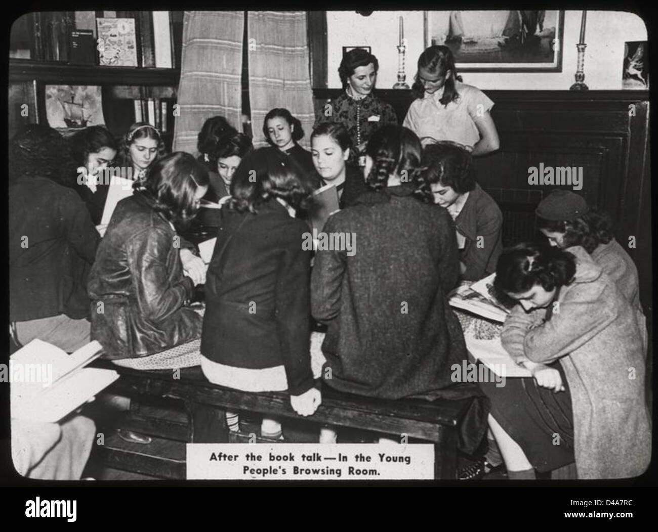 A 1938 photograph of students in the browsing room of the Aguilar ...