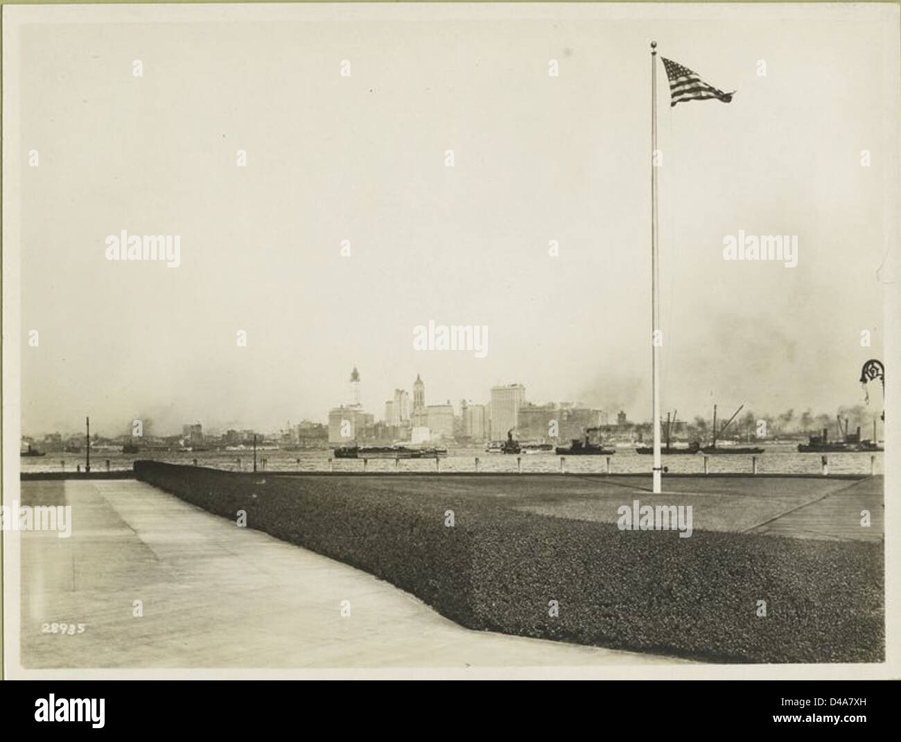 A 1913 photograph taken from Ellis Island, featuring a view of the New ...