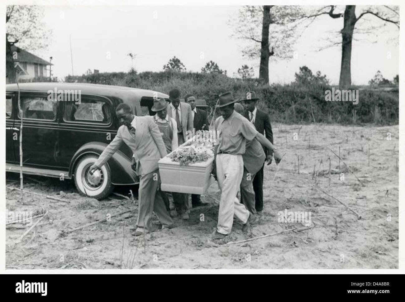 This 1941 photograph by Jack Delano captures the funeral of a 19-year ...