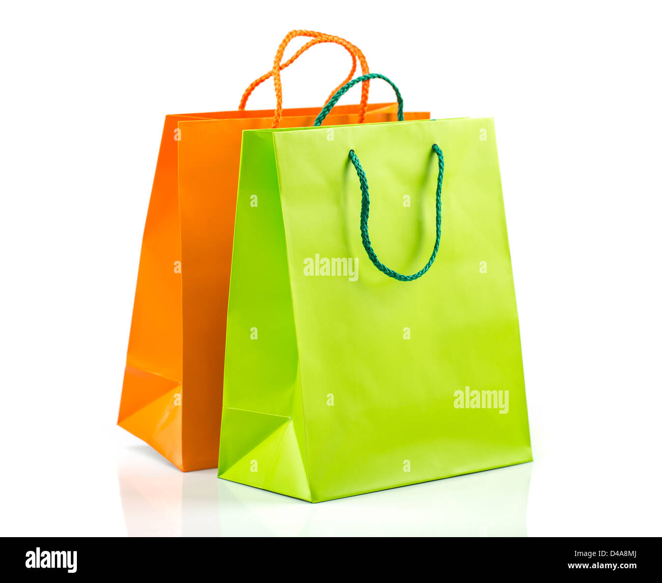 Two paper Shopping bags with reflection on white Stock Photo - Alamy