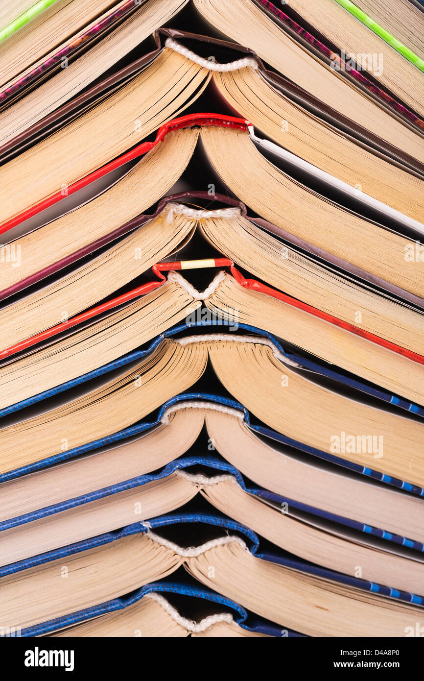 Stack of open books close-up Stock Photo - Alamy