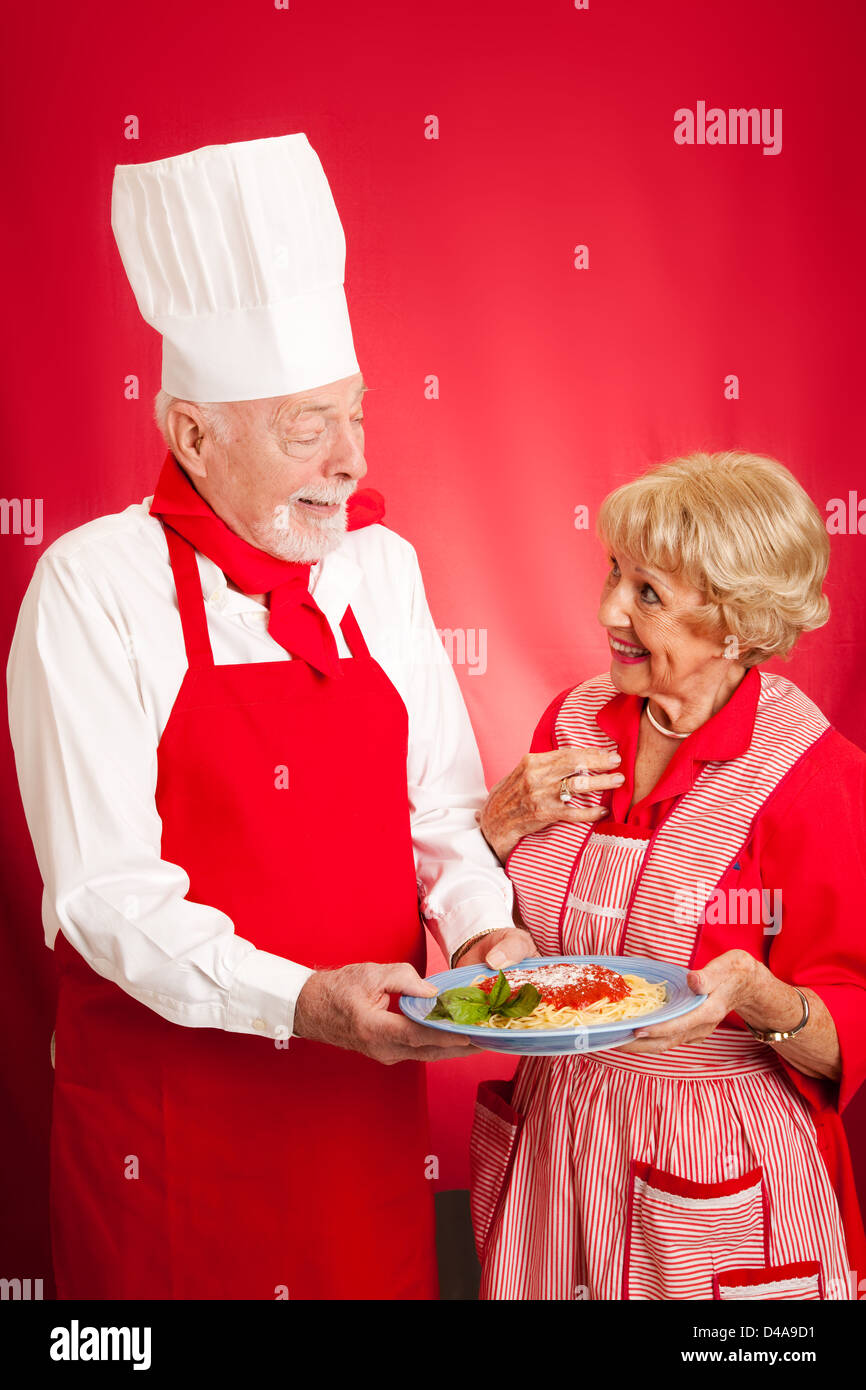 Chef teaching a sweet elderly grandma how to cook authentic Italian ...